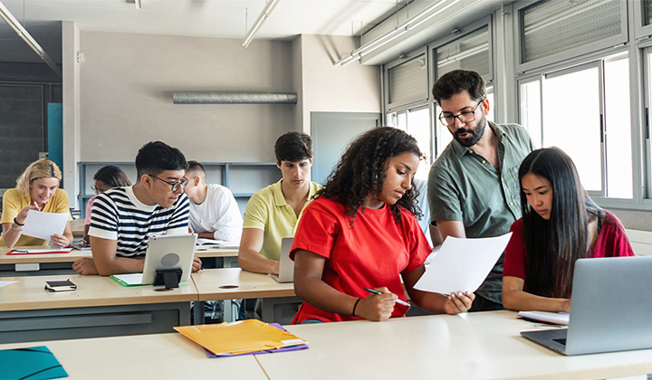 A teacher leading a classroom discussion